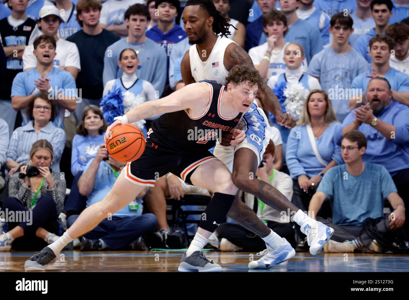 Campbell forward Colby Duggan (2) works against North Carolina forward ...