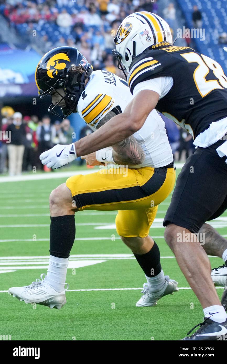 Iowa quarterback Brendan Sullivan (1) is stopped short of the end zone ...