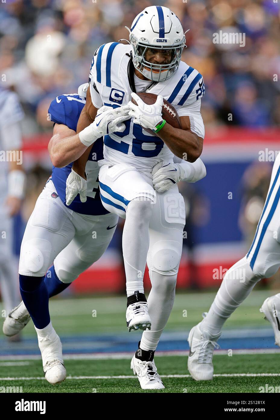 Indianapolis Colts running back Jonathan Taylor (28) runs with the ball ...