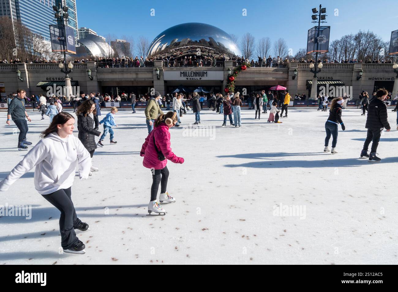 Chicago, USA. 30 December 2024. Tourists skate on the outdoor ice rink ...
