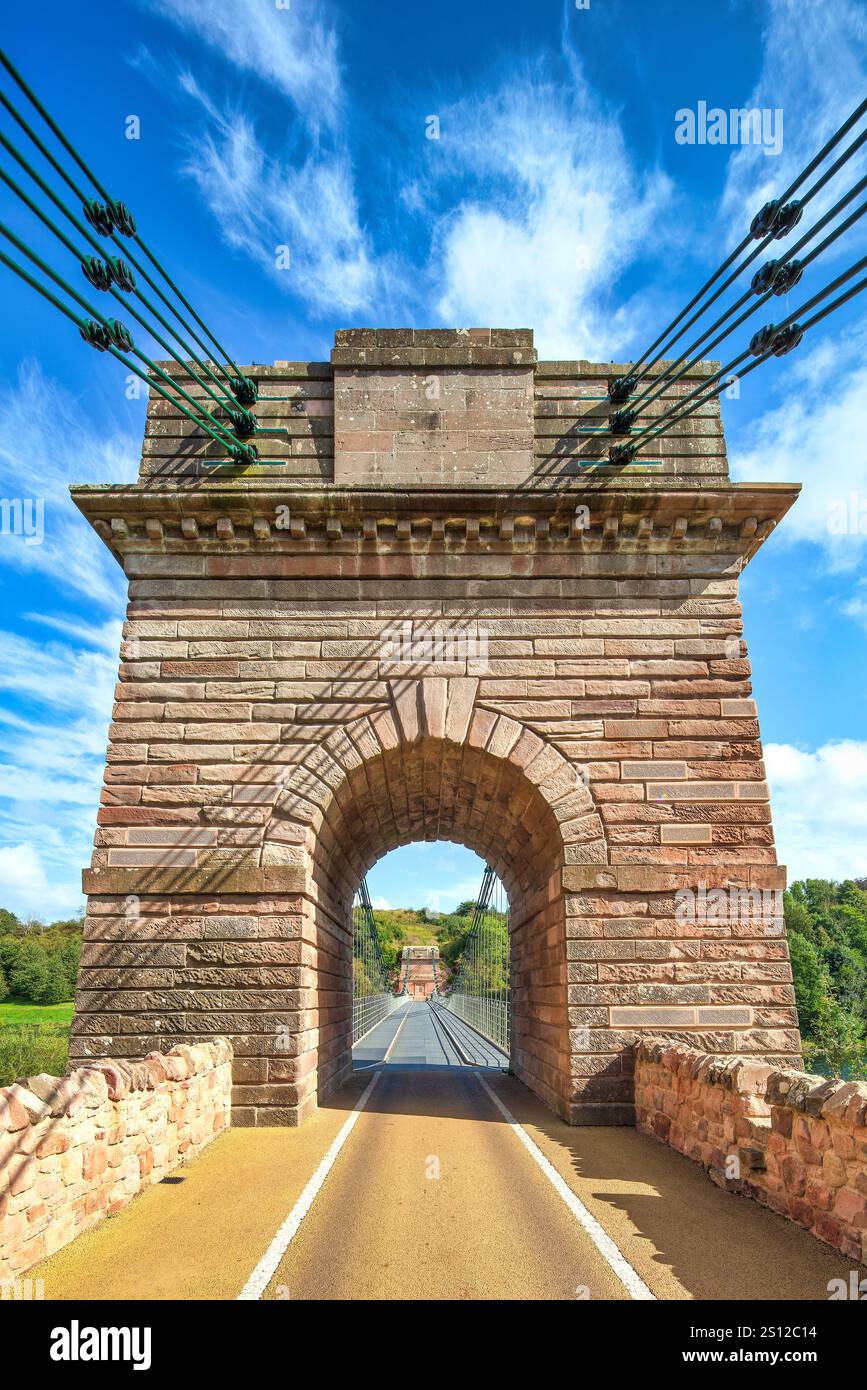 Daytime view in summer of the Chain Suspension Bridge over the River ...