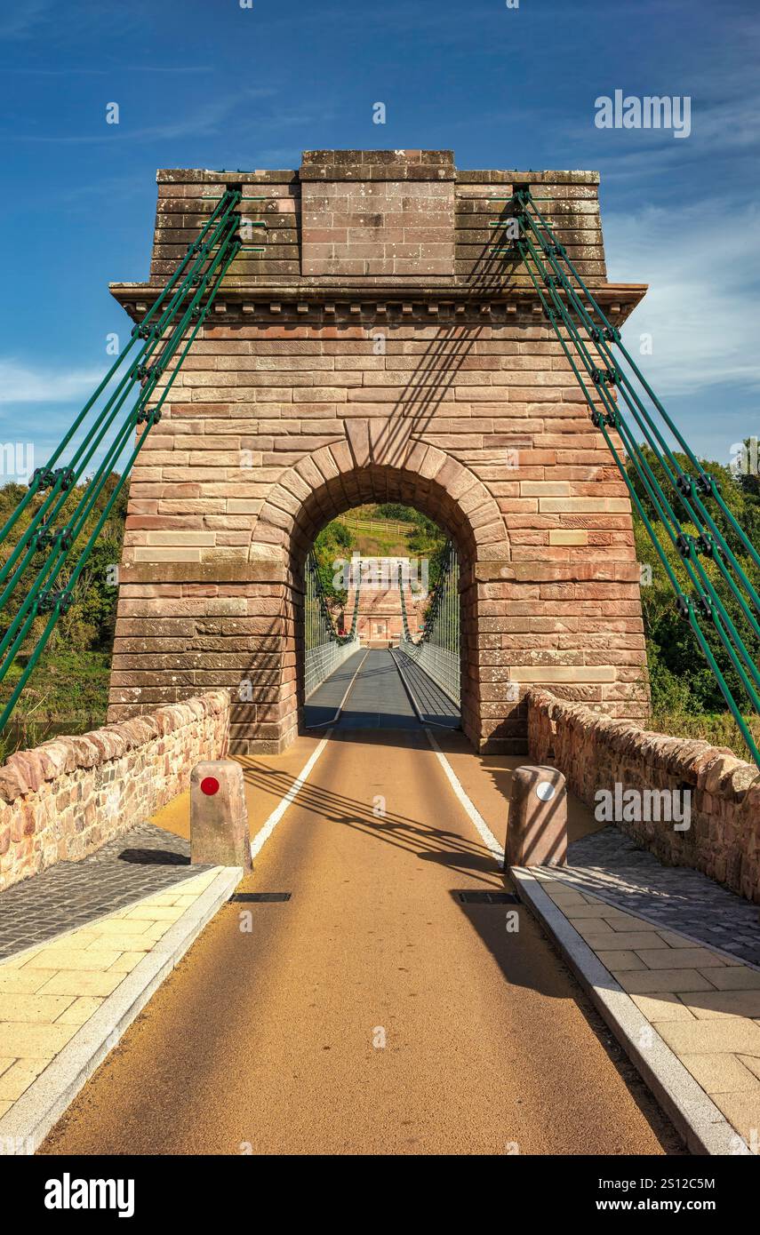 Daytime view in summer of the Chain Suspension Bridge over the River ...