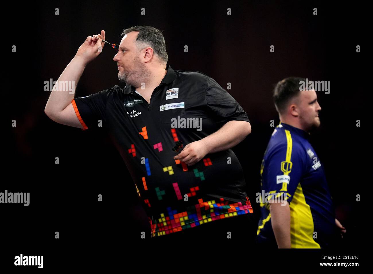 Ryan Joyce throws during his match with Luke Littler during day ...