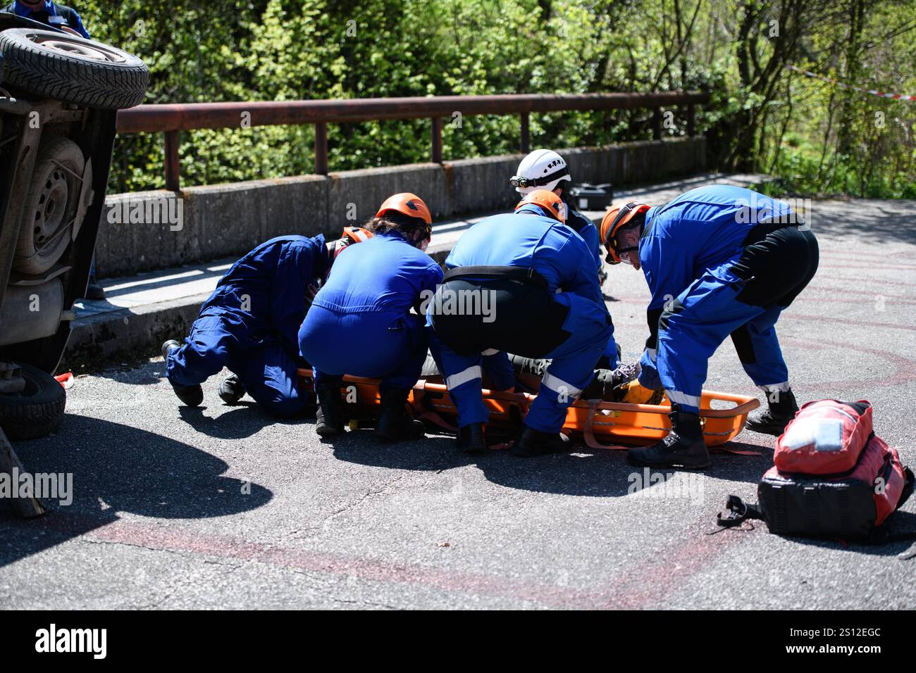 Medical responder checking injured person after being rescued from ...