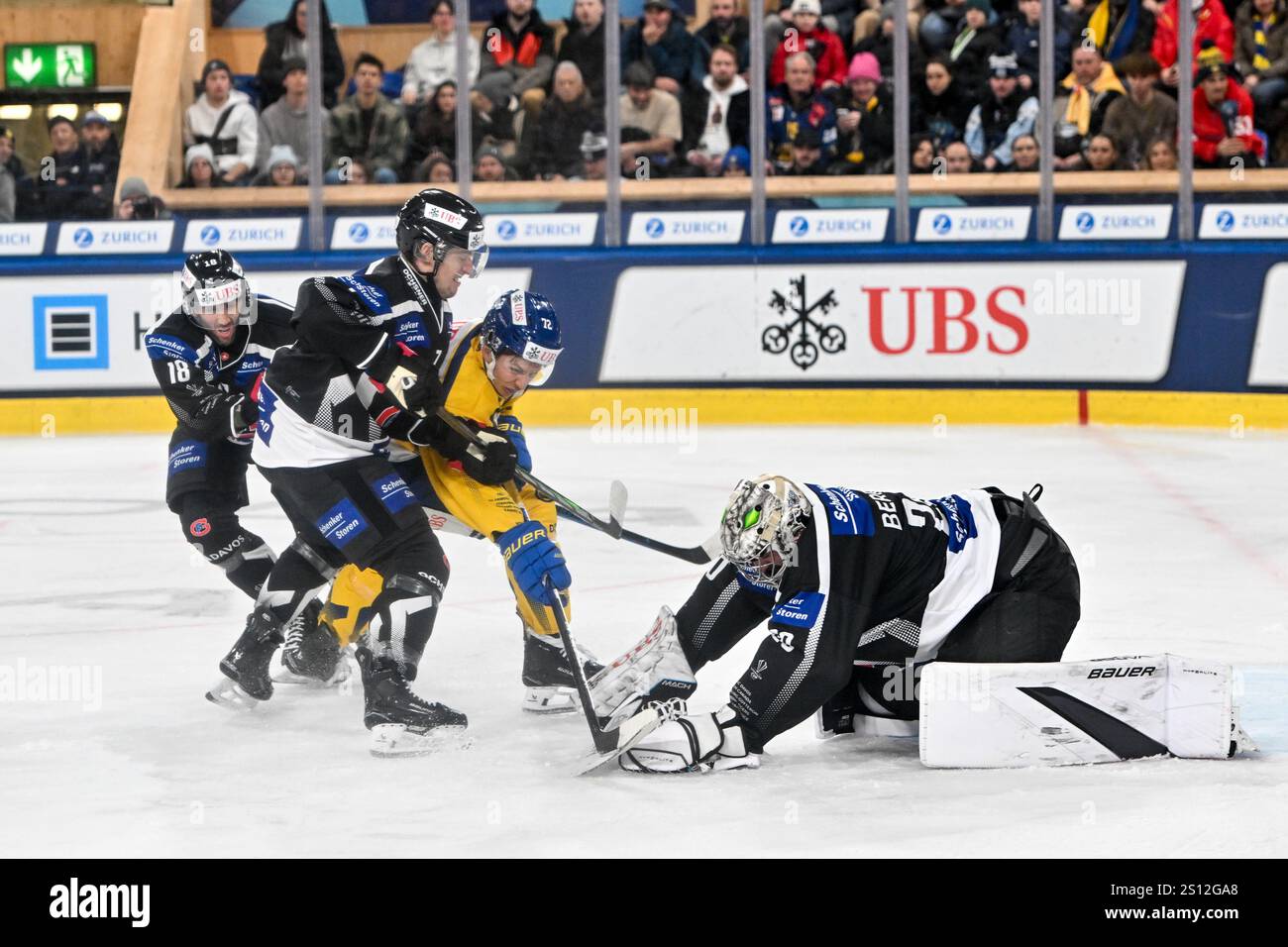 Davos, Switzerland. 30th Dec, 2024. DAVOS, SWITZERLAND - DECEMBER 30: Tino Kessler of HC Davos C ...