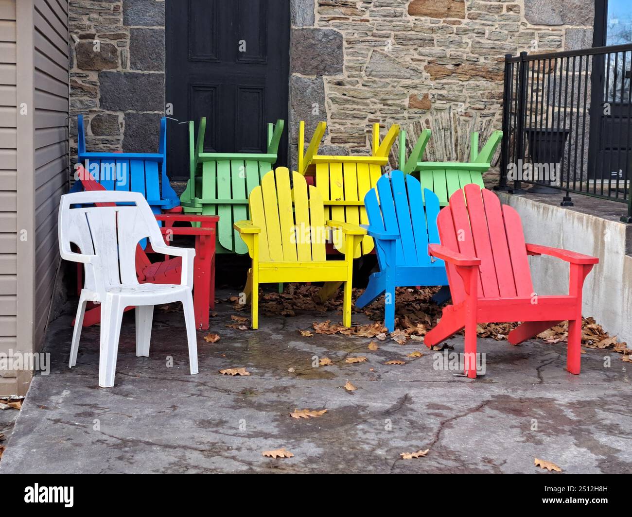 Colorful Adirondack chairs stored for the winter at the Franco-Ontarian ...