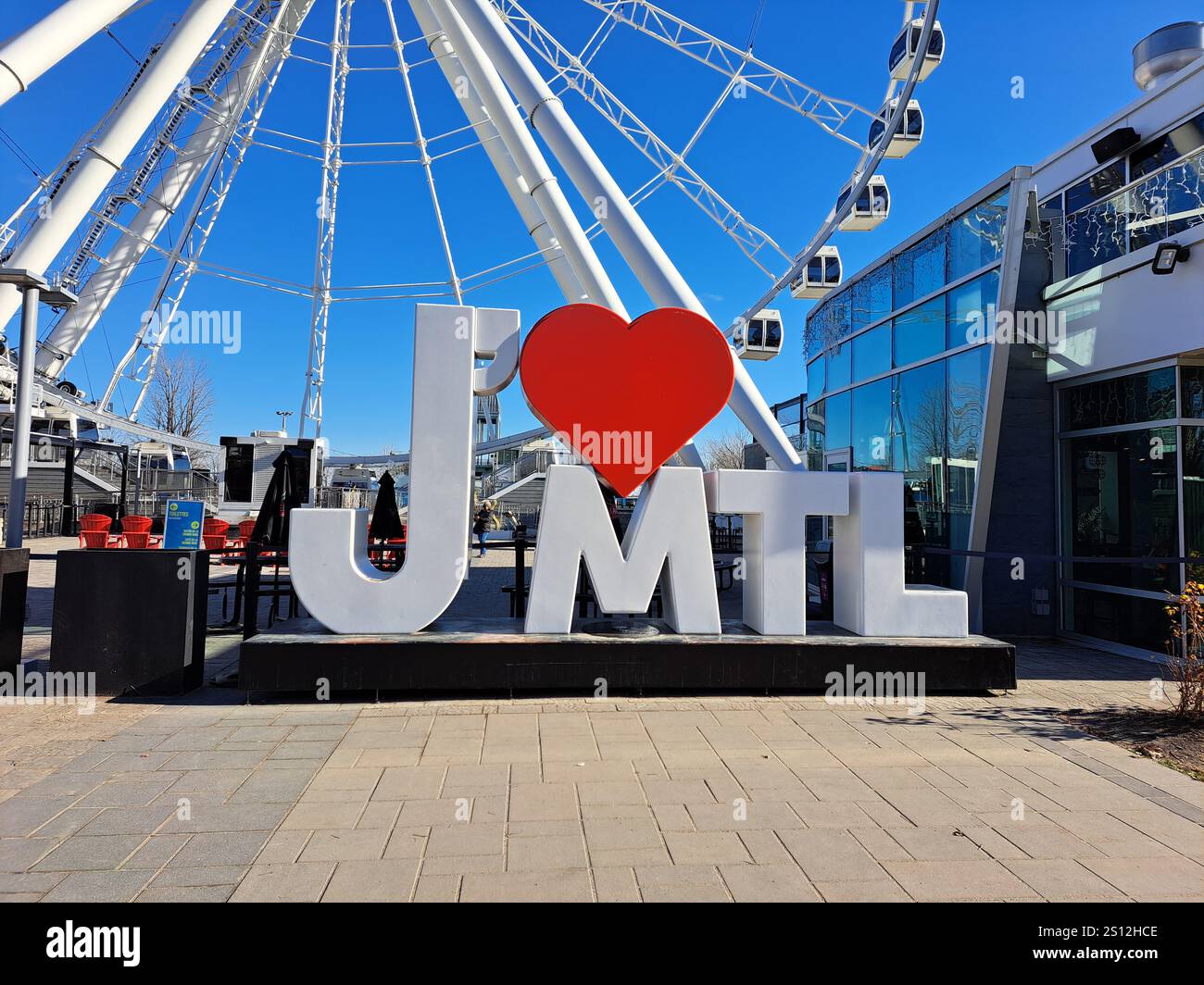 I heart MTL sign beside La Grande Roue ferris wheel in vieux Montreal ...