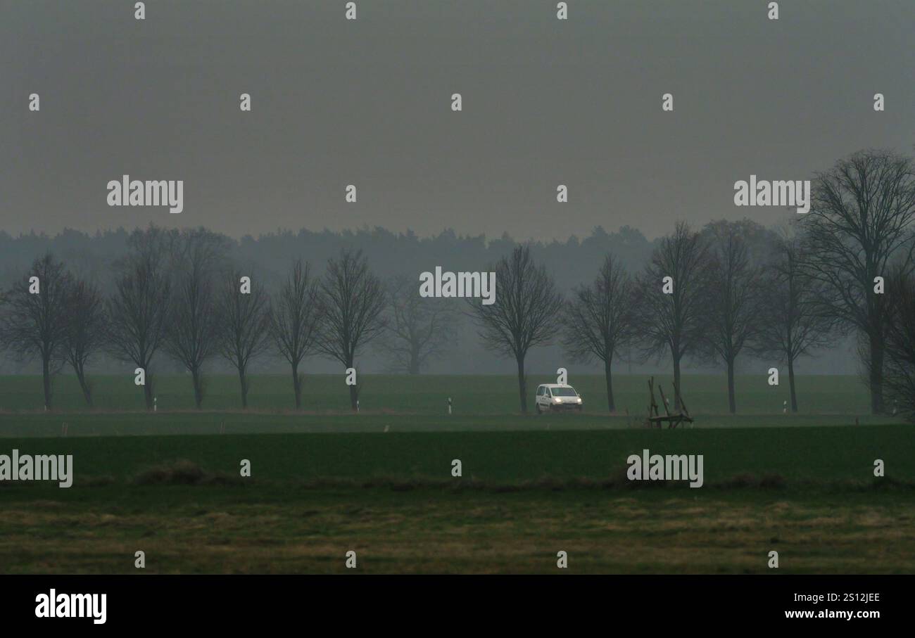 Anklam, Germany. 14th Dec, 2024. 14.12.2024, Anklam. A car drives along ...