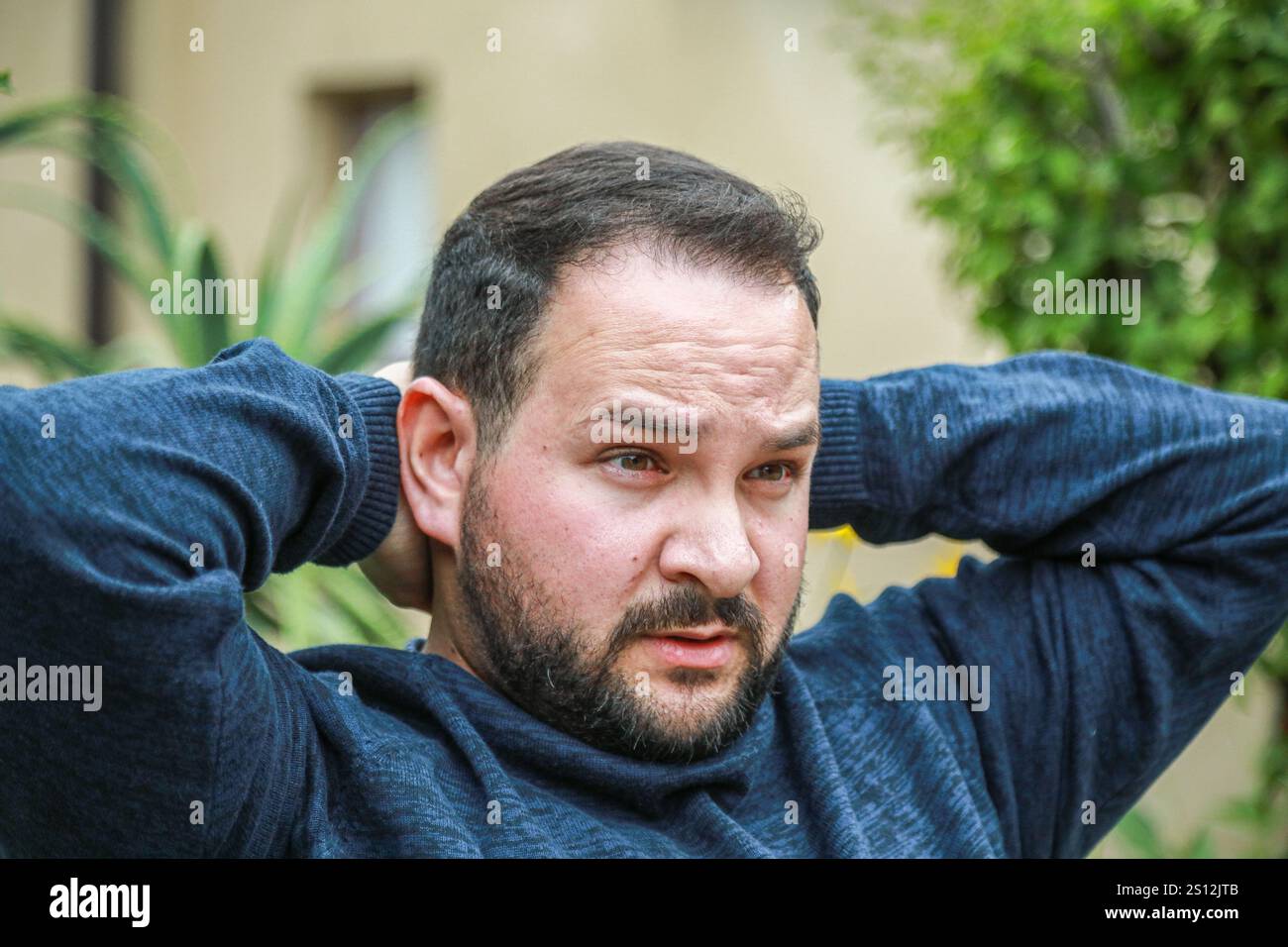 Eyes Almost Closed Of A Tired Man Stock Photo - Alamy