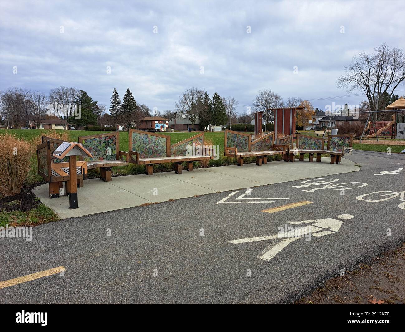 Artistic wooden benches at Bellevue Park in Pincourt, Quebec, Canada ...