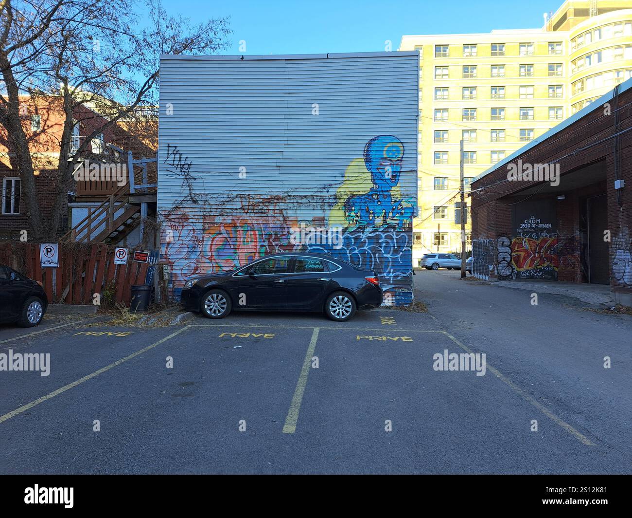 Angry blue man mural in downtown Montreal, Quebec, Canada Stock Photo ...
