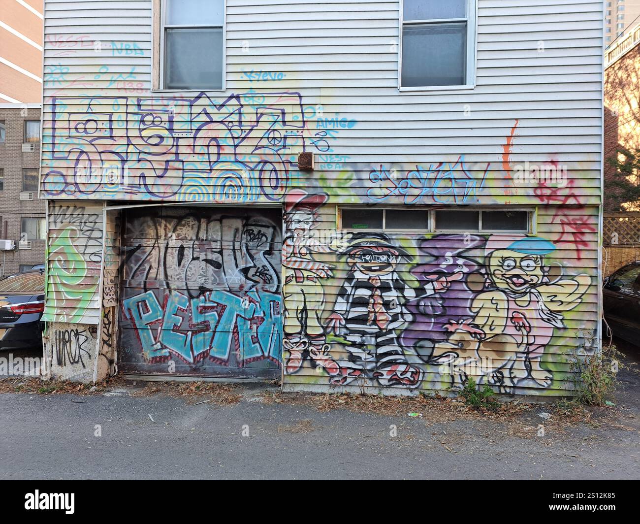 Graffiti on garage roll up door in downtown Montreal, Quebec, Canada ...