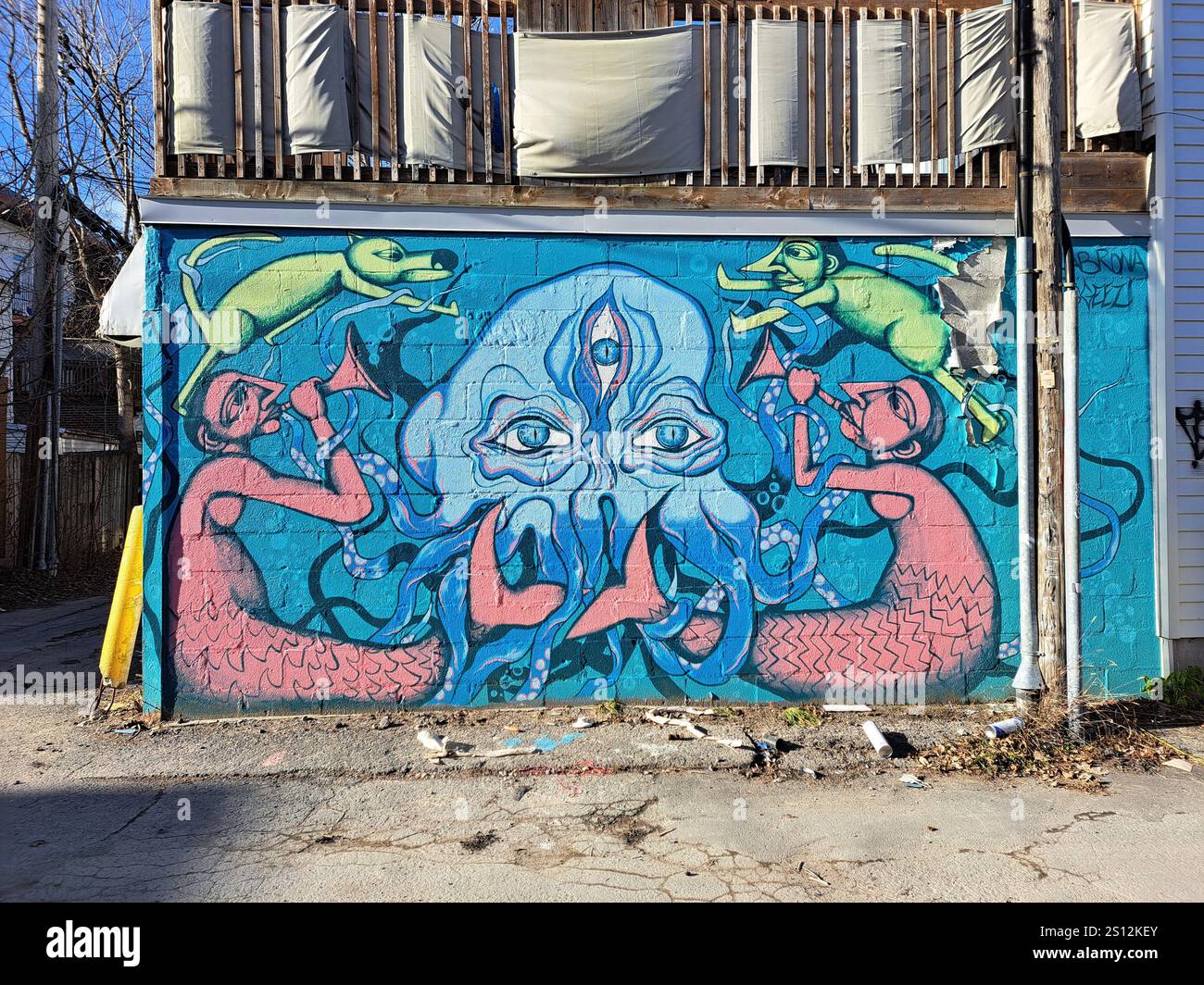 Octopus and mermaids playing horns mural in Hochelaga neighborhood in ...