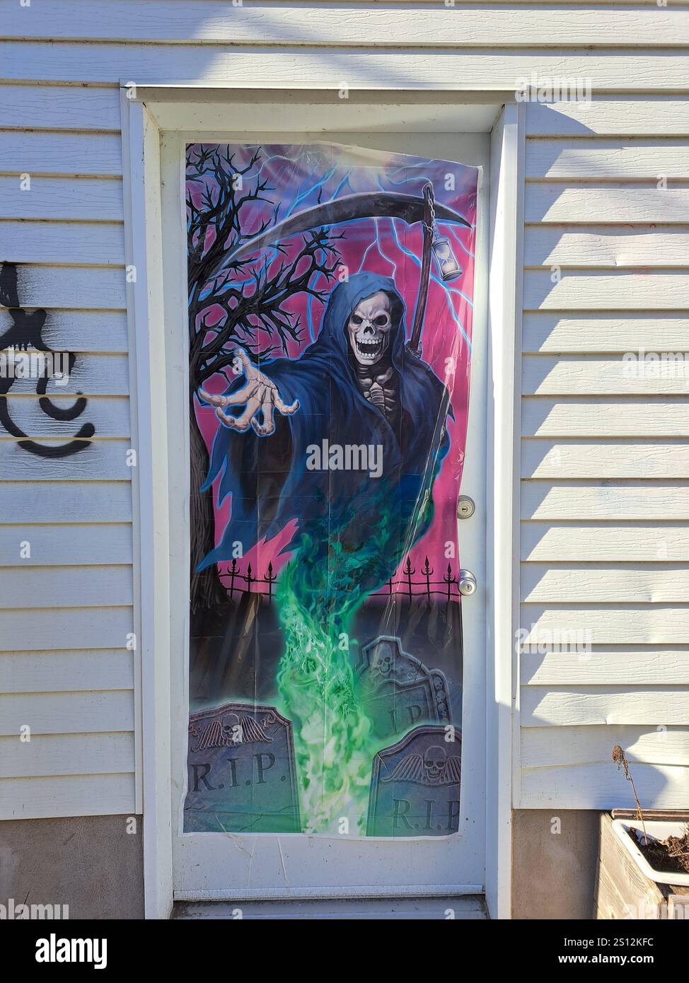 Grim reaper mural on a door in Hochelaga neighborhood in Montreal ...