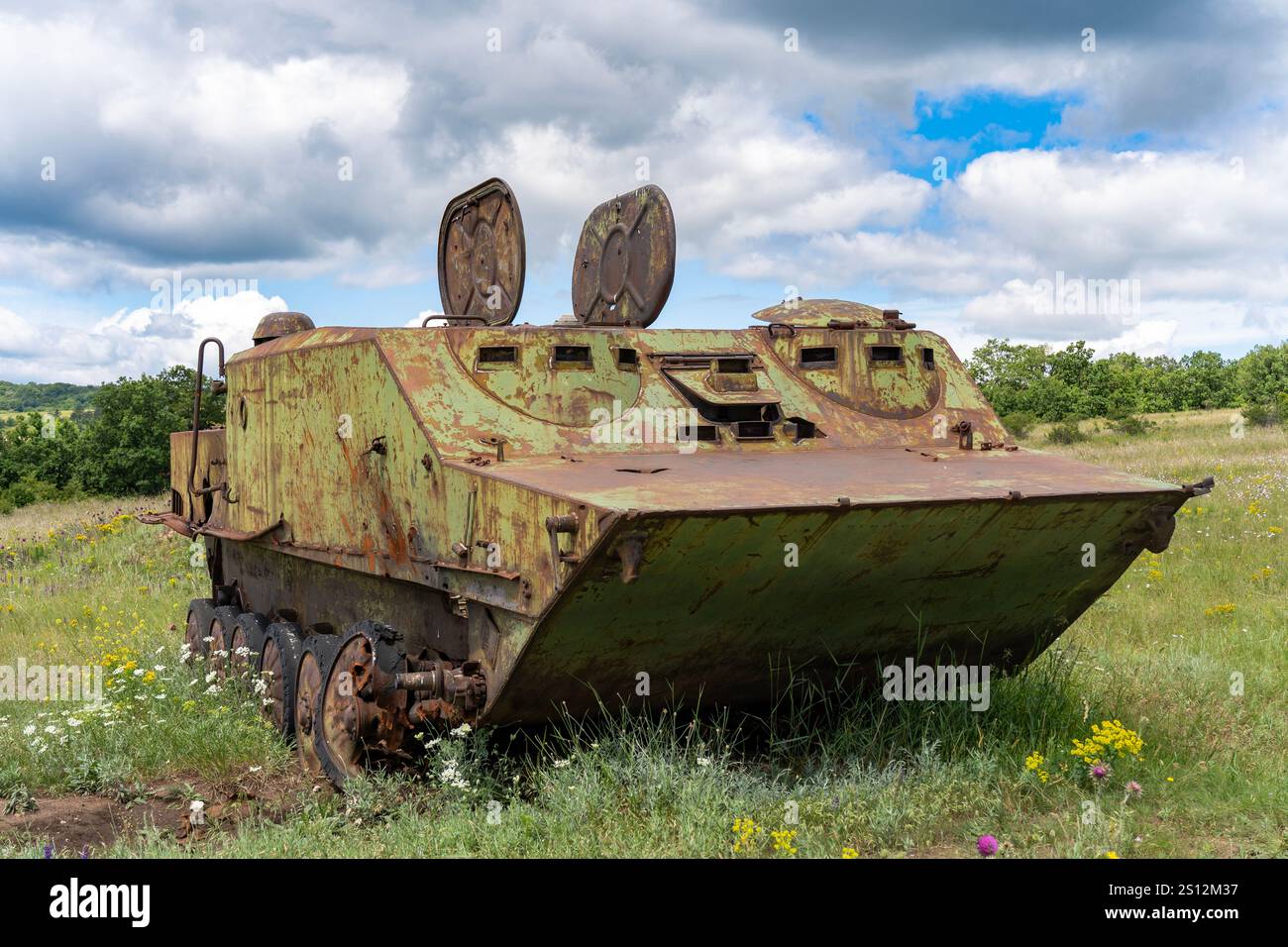 Rusty old soviet BTR-50 military vehicle wreck in a field Stock Photo ...