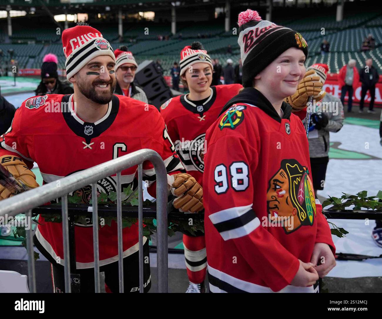 Chicago Blackhawks left wing Nick Foligno, left, and center Connor ...