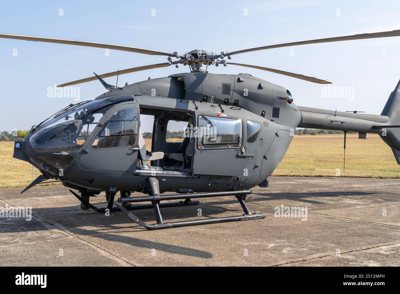 Gray painted modern H145M military transport helicopter stationary on ...