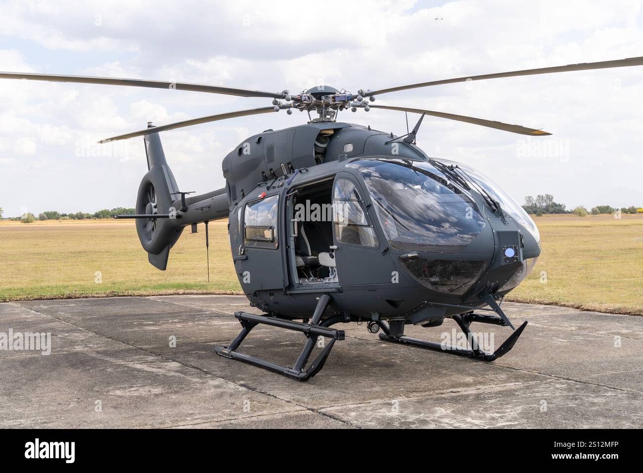 Gray painted modern H145M military transport helicopter stationary on ...