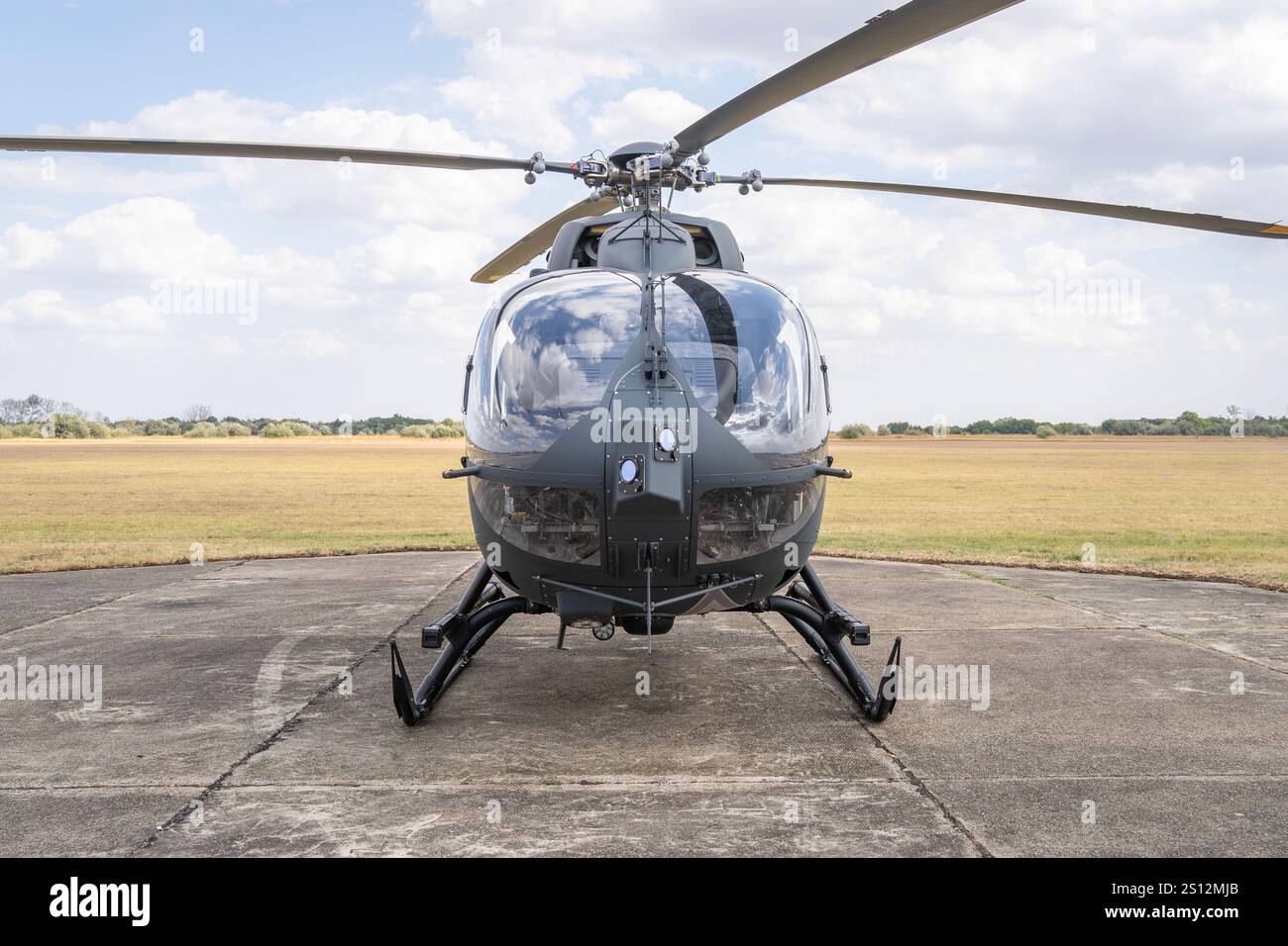 Gray painted modern H145M military transport helicopter stationary on ...