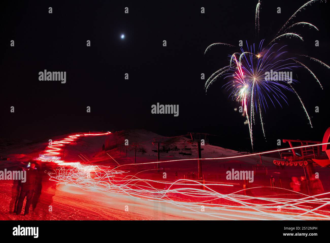 Festive Fireworks Over Snowy Mountain Ski Resort During Night ...