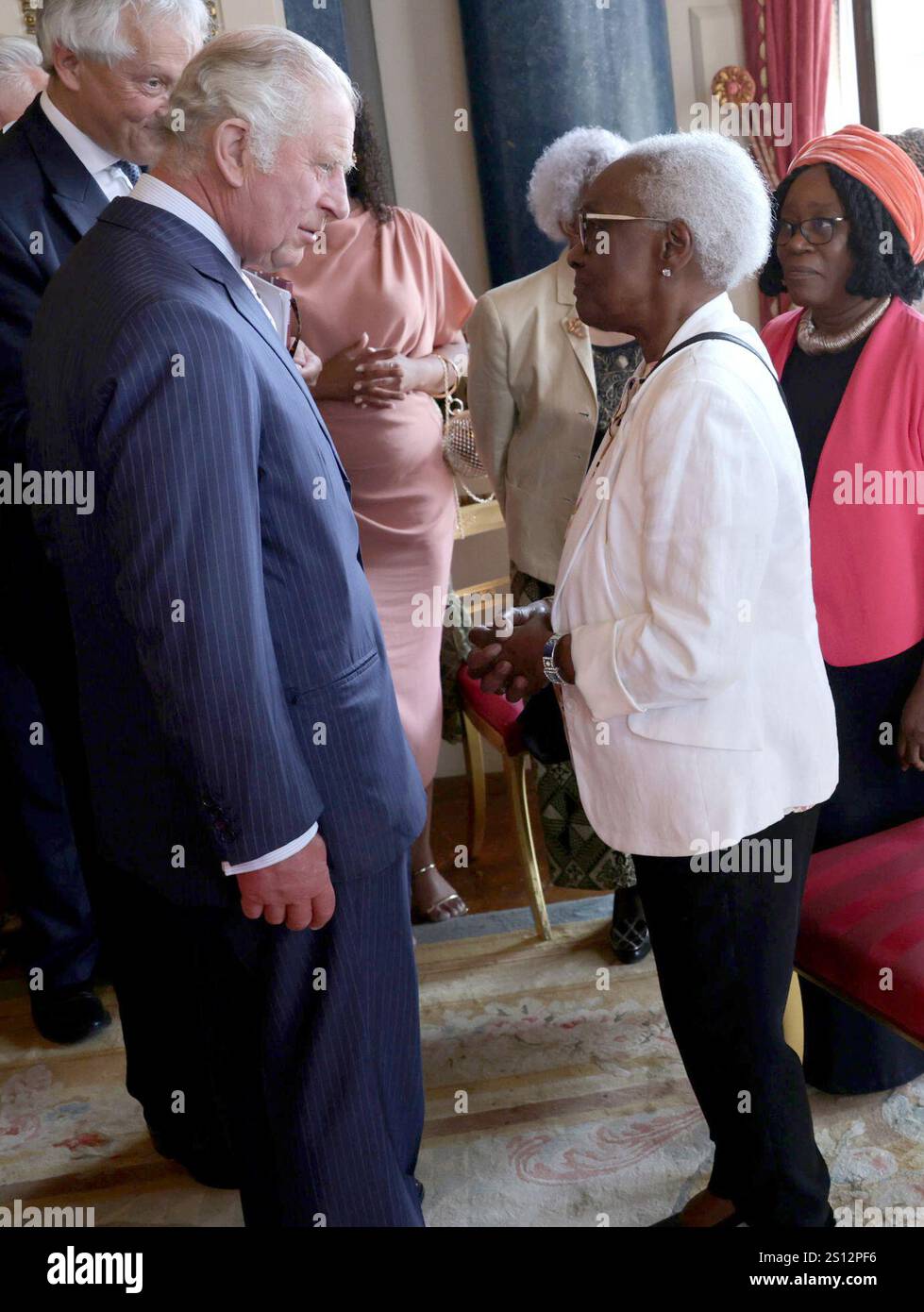 File photo dated 22/06/23 of King Charles III with actor Carmen Esme ...
