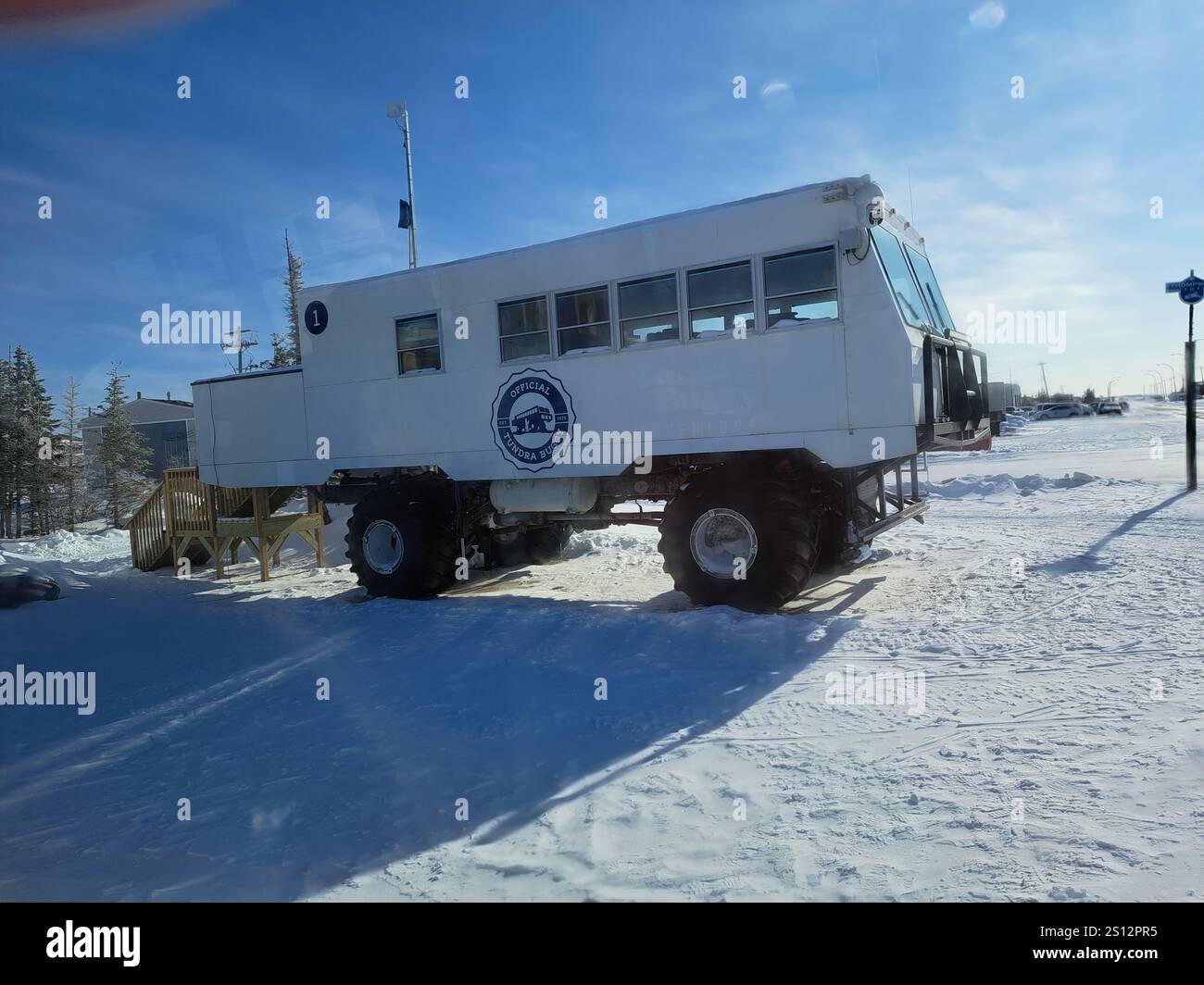Tundra buggy parked in downtown Churchill, Manitoba, Canada Stock Photo ...