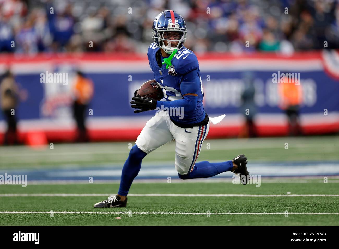 New York Giants cornerback Dru Phillips (22) returns an interception ...