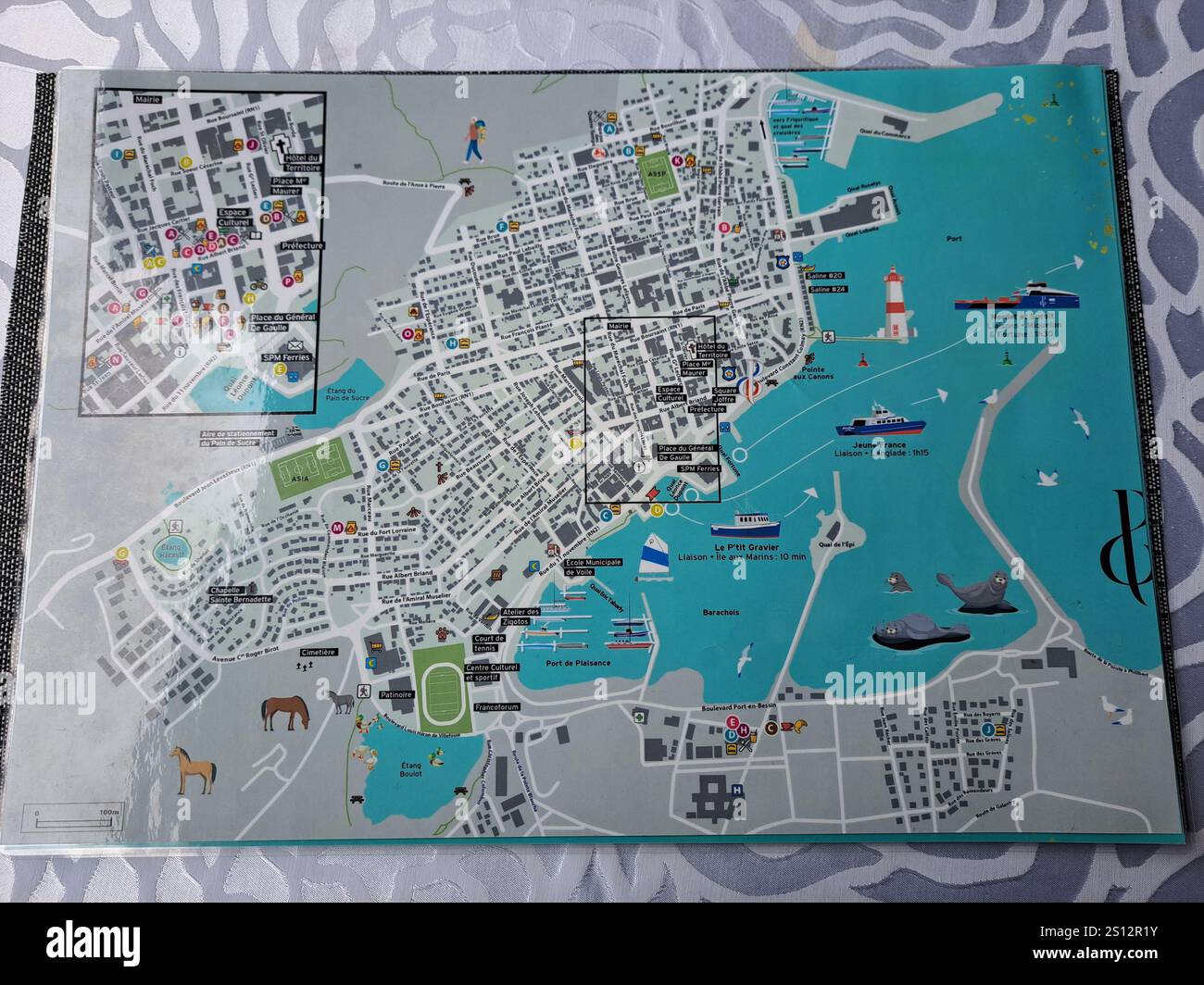 Map of downtown on the kitchen table at Nuits Saint-Pierre hotel in St ...