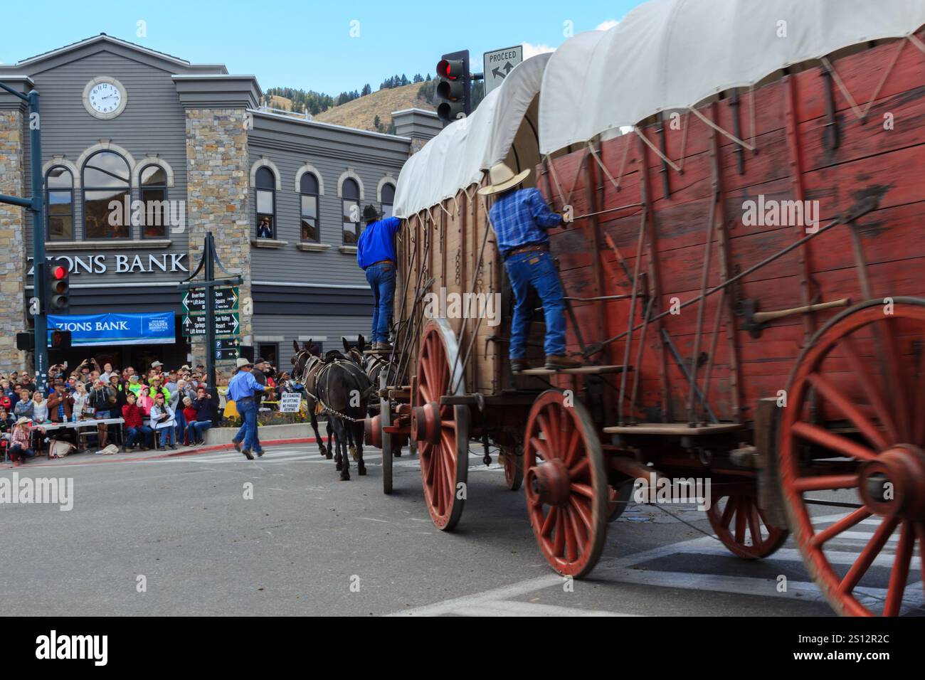 Traditional Wagon Parade Through Historic Town Street with Mules and ...
