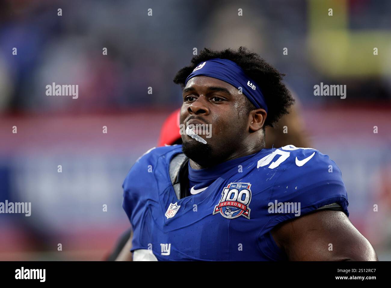 New York Giants defensive tackle Elijah Chatman (94) reacts after an ...