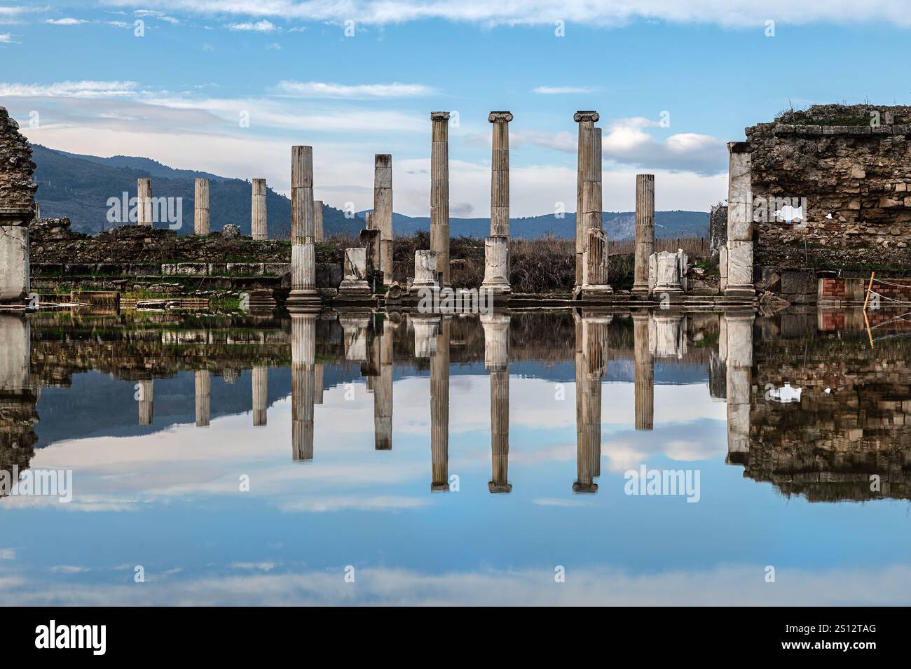 Reflection and ancient columns in the Magnesia ancient city Stock Photo ...