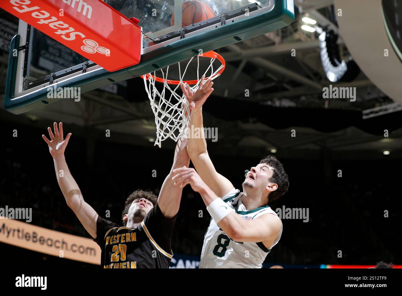 Michigan State forward Frankie Fidler, right, shoots against Western ...