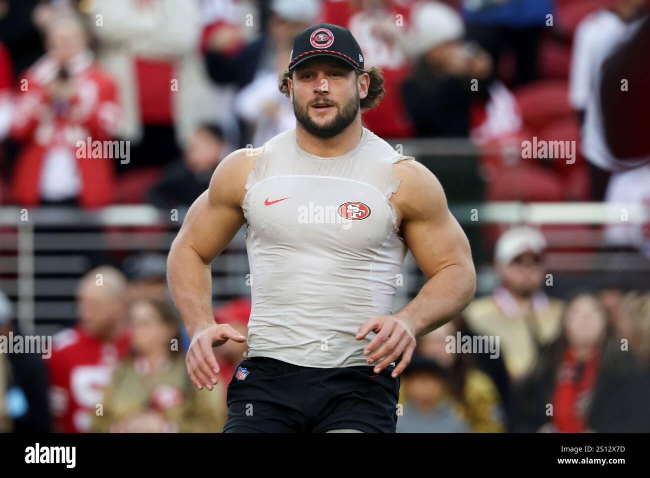 San Francisco 49ers defensive end Nick Bosa warms up before an NFL ...