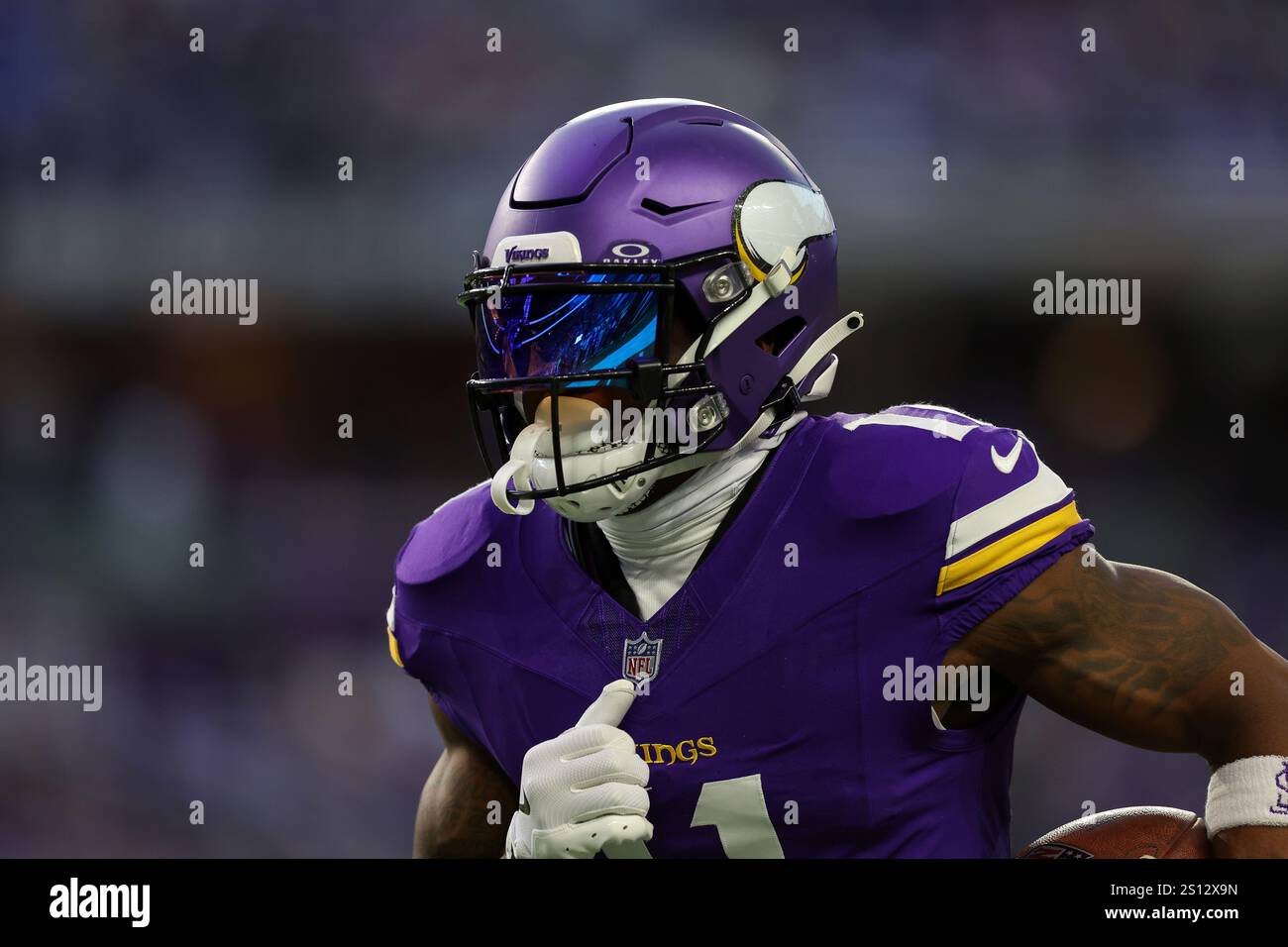 Minnesota Vikings wide receiver Trent Sherfield Sr. warms up before an ...
