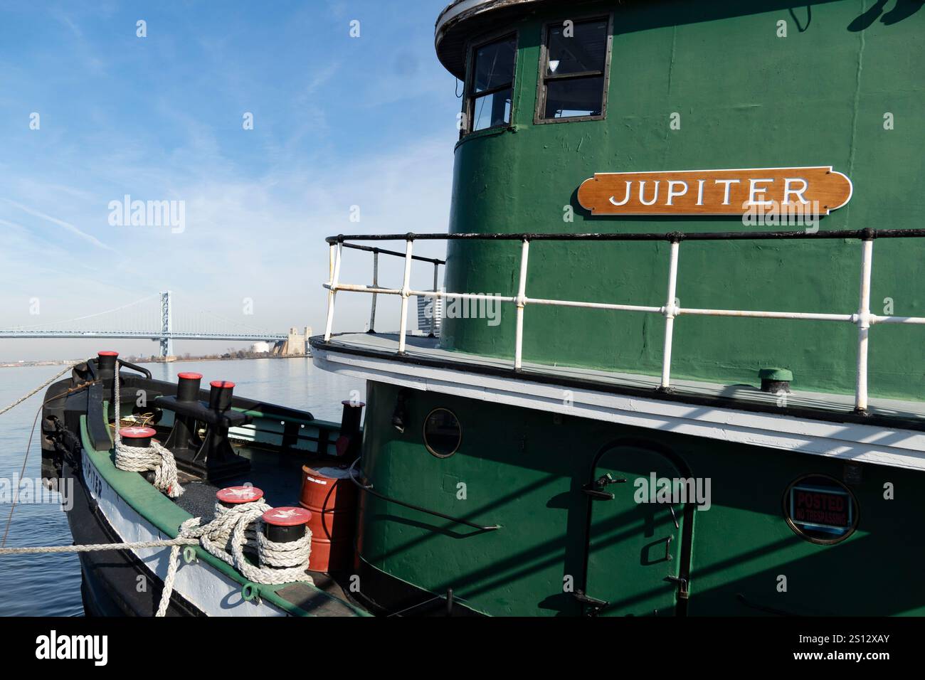 Tugboat Jupiter in the Delaware River with the Ben Franklin Bridge ...