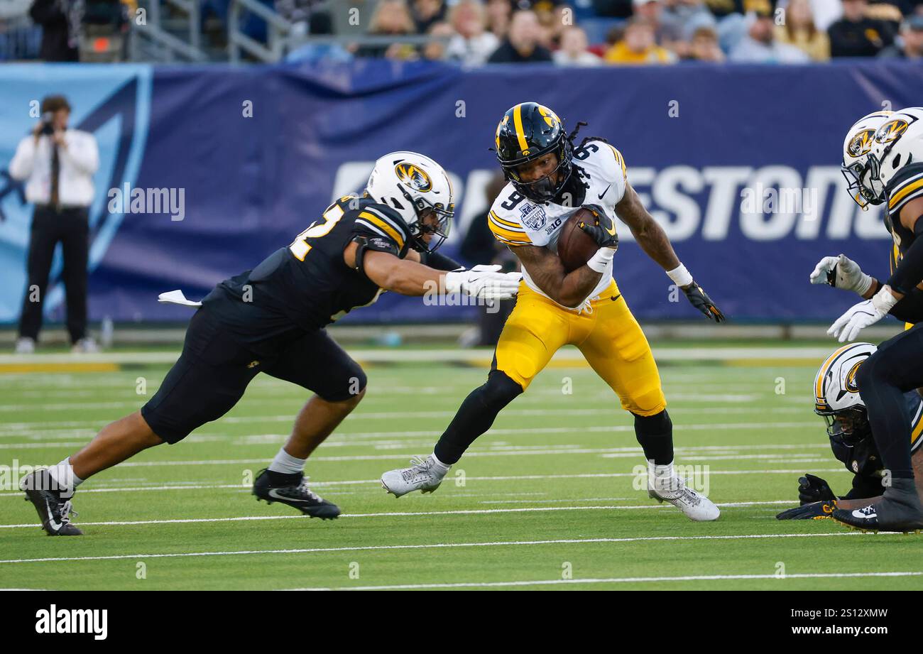 December 30, 2024: Iowa Hawkeyes RB #9 Jaziun Patterson slips away from ...