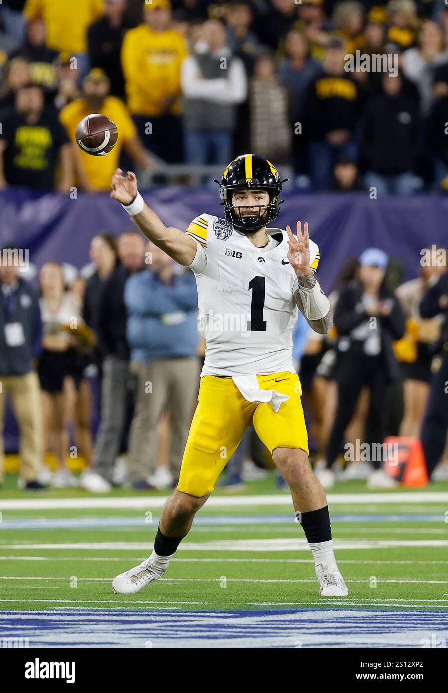 Nashville, TN, USA. 30th Dec, 2024. Iowa Hawkeyes QB #1 Brendan ...