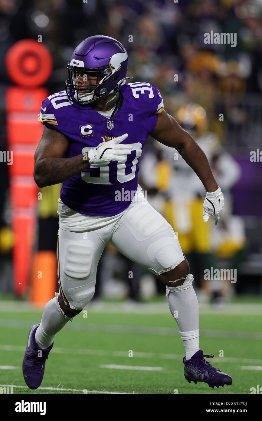 Minnesota Vikings fullback C.J. Ham moves across the field during the ...