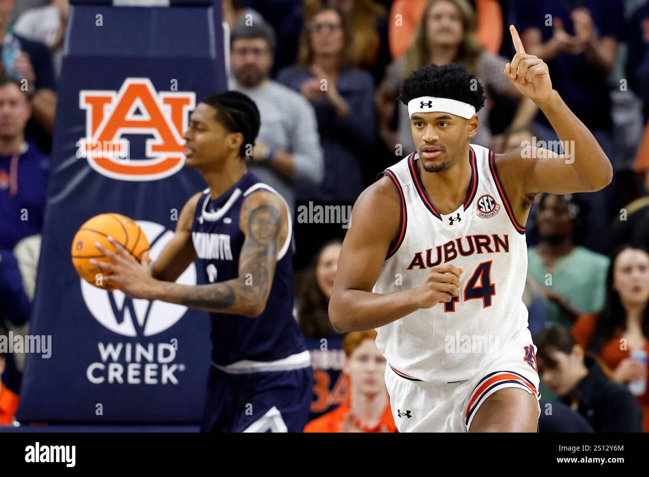 Auburn center Dylan Cardwell reacts after making a basket during the ...