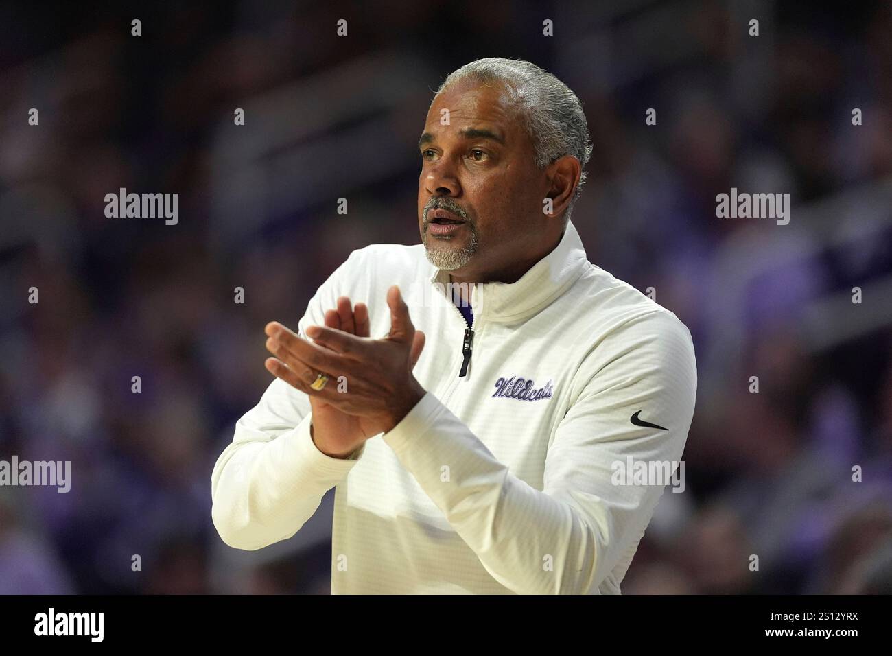 Kansas State head coach Jerome Tang watches during the first half of an ...