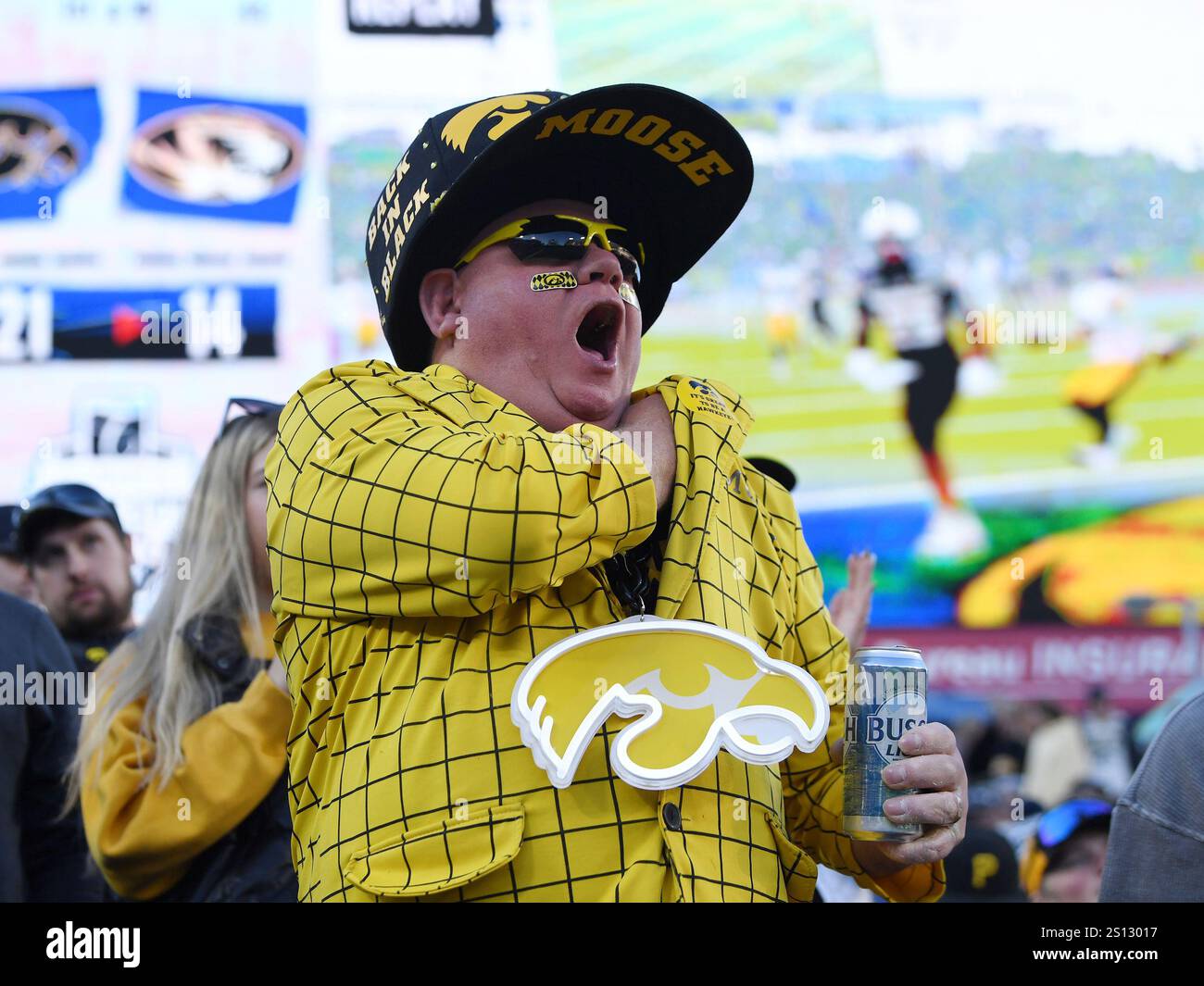 NASHVILLE, TN - DECEMBER 30: A Iowa Hawkeyes fan cheers during the Iowa ...