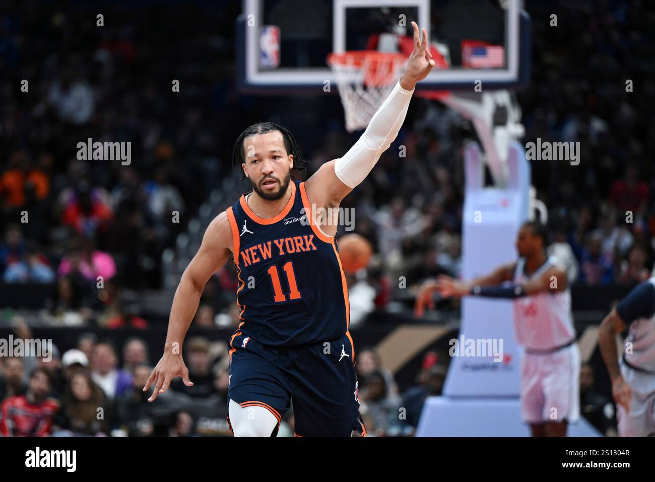 New York Knicks guard Jalen Brunson (11) gestures after making a three ...