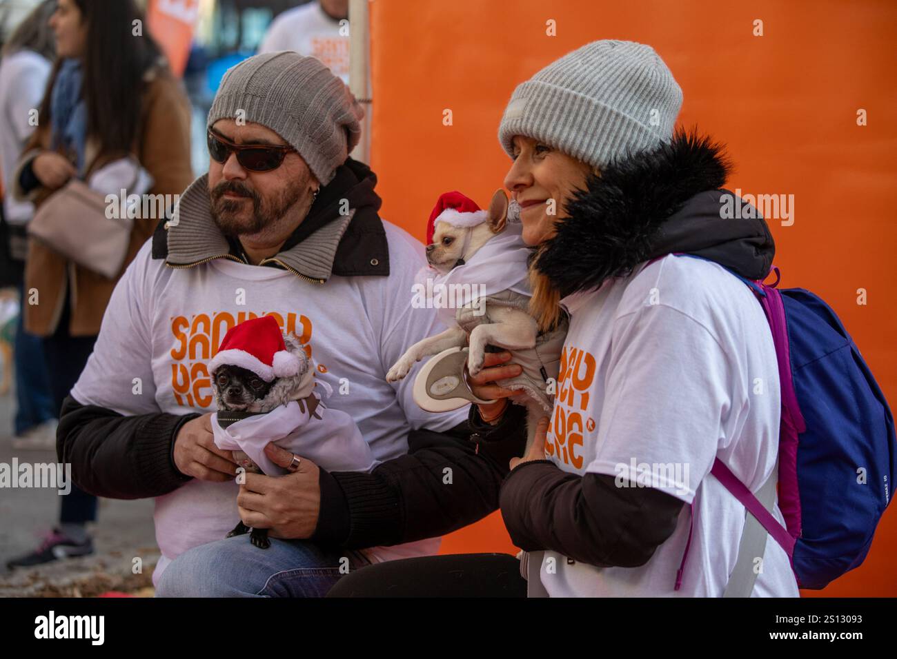 Madrid, Spain. 30th Dec, 2024. People pose with their dogs before the ...