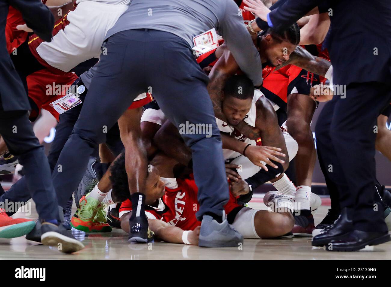 From left, Houston Rockets forward Amen Thompson, Miami Heat guard ...