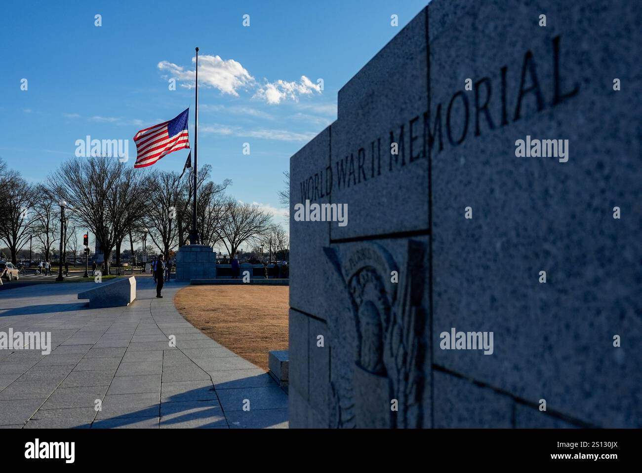 Flags fly at half mast in Washington to honor the passing of President ...