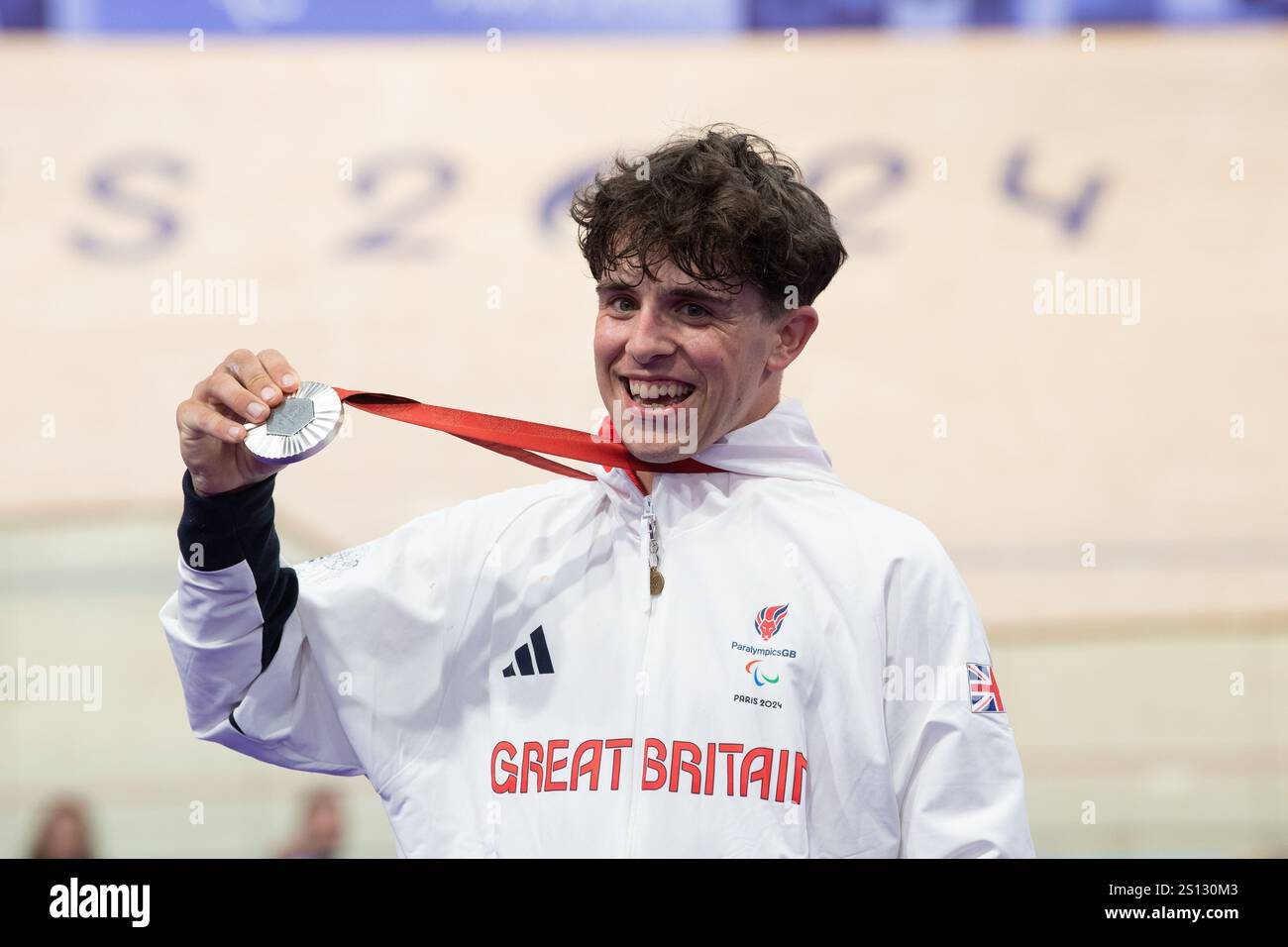 Archie Atkinson of Great Britain shows off his silver medal on the ...
