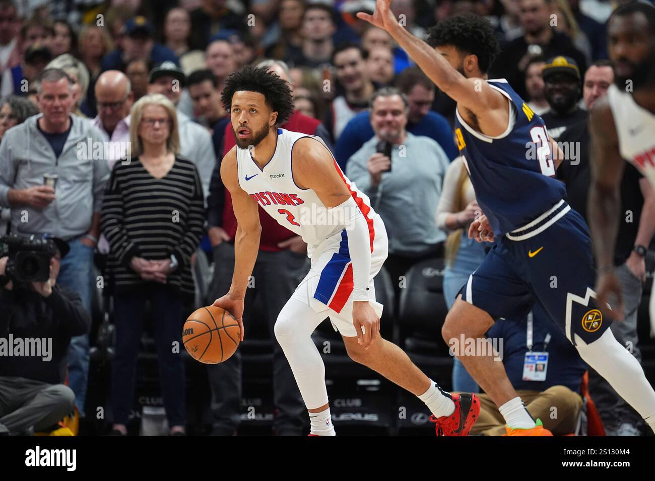 Detroit Pistons guard Cade Cunningham (2) and Denver Nuggets guard ...