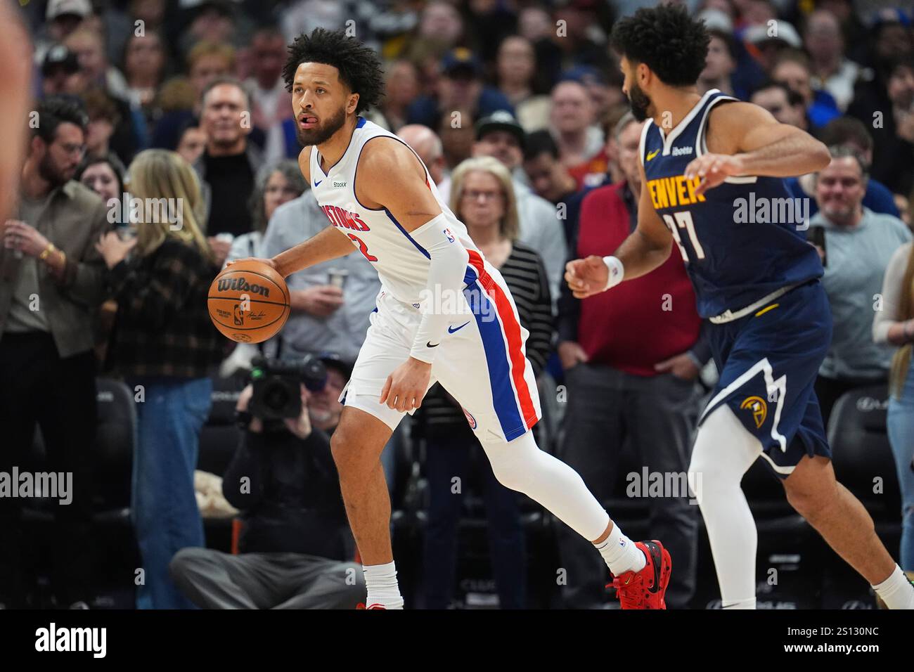 Detroit Pistons guard Cade Cunningham (2) and Denver Nuggets guard ...
