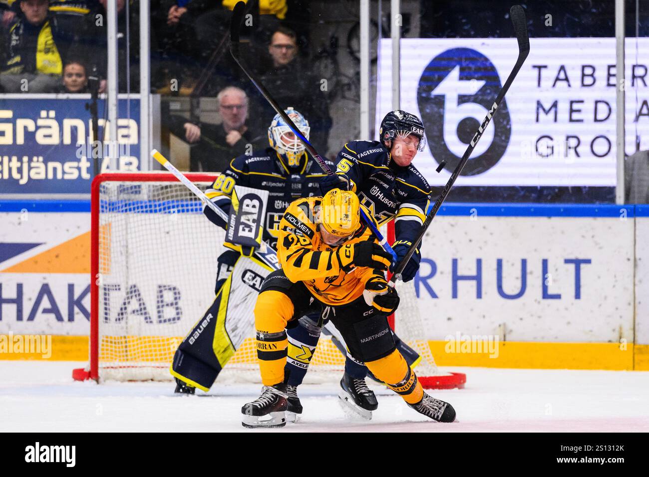 241230 Skellefteås Michael Brandsegg-Nygård och HV71s Victor Sjöholm under ishockeymatchen i SHL ...
