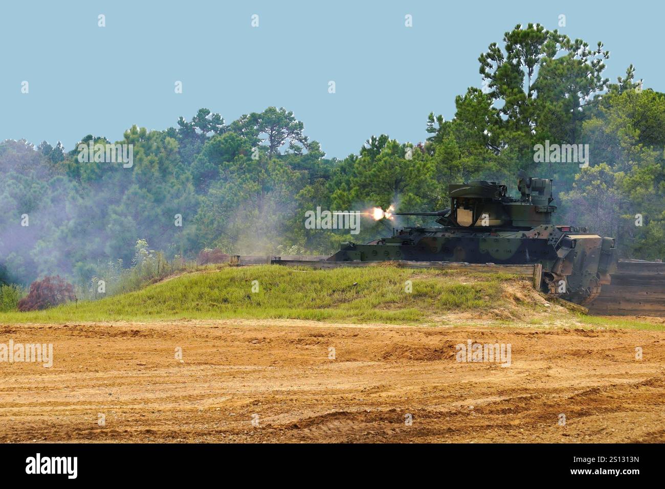 A Bradley Fighting Vehicle launches a missile during a live fire ...